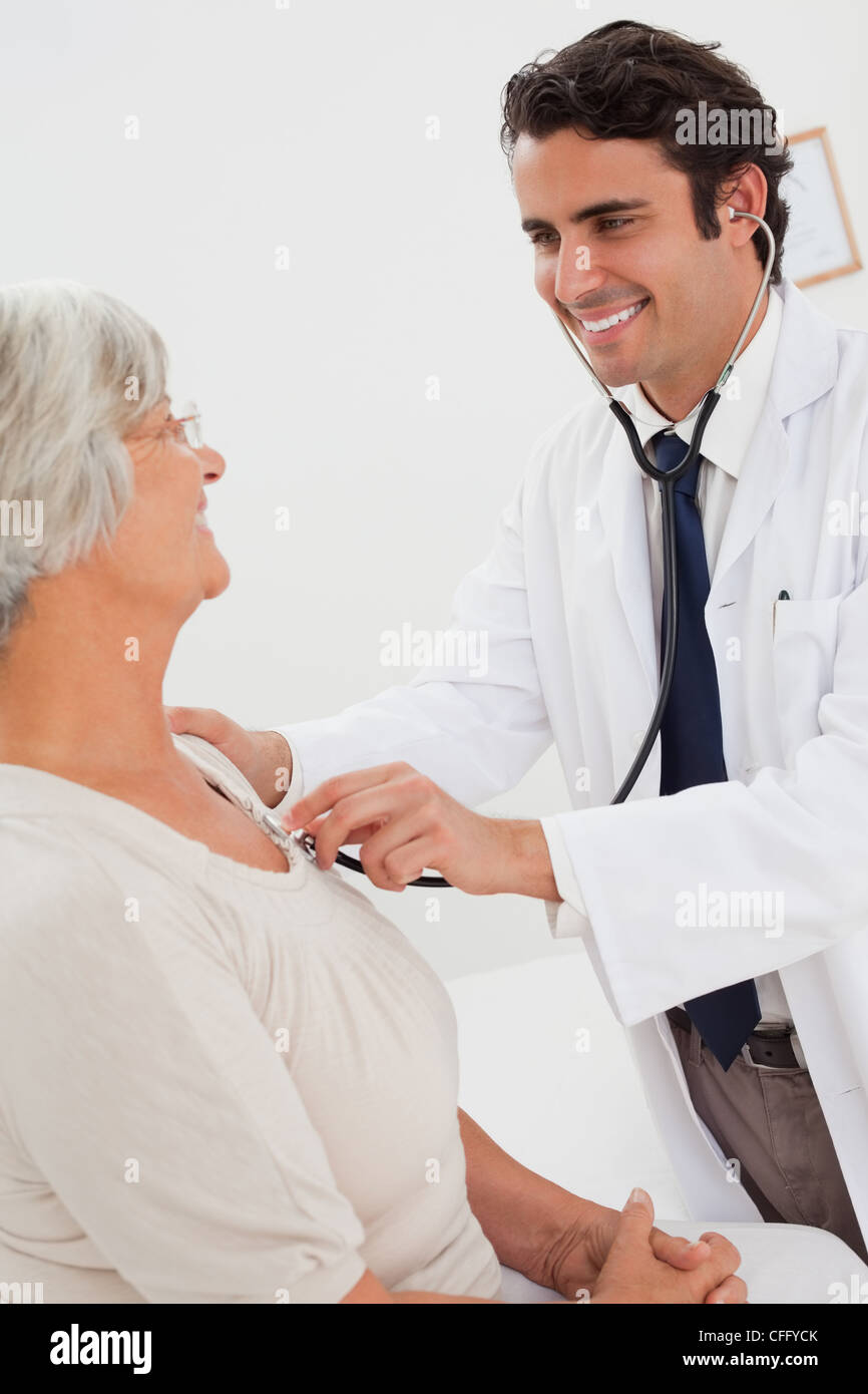 Mature doctor measuring patients hi-res stock photography and images ...