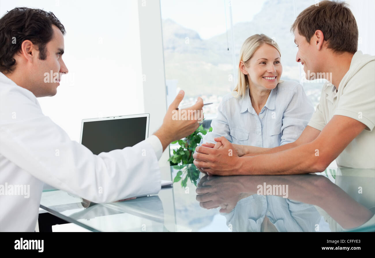 Couple got good news from their doctor Stock Photo - Alamy