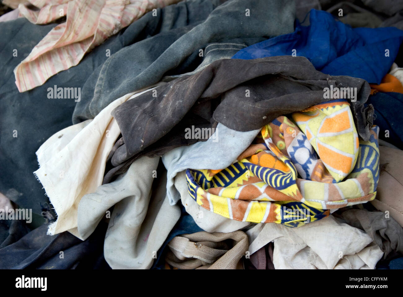 Clothes of victims of the Khmer Rouge regime are on display at Choeung ...