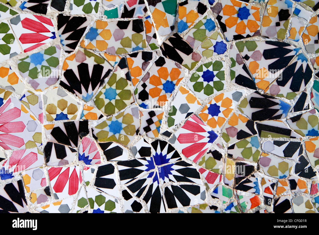 Detail of Antonio Gaudi's mosaic tile artwork at Parc Guell in ...