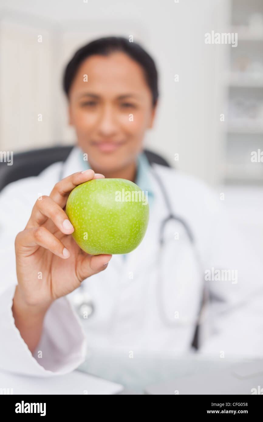 Held at apple hi-res stock photography and images - Alamy