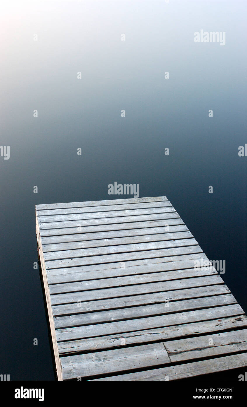 Empty Dock on Calm Lake Stock Photo - Alamy