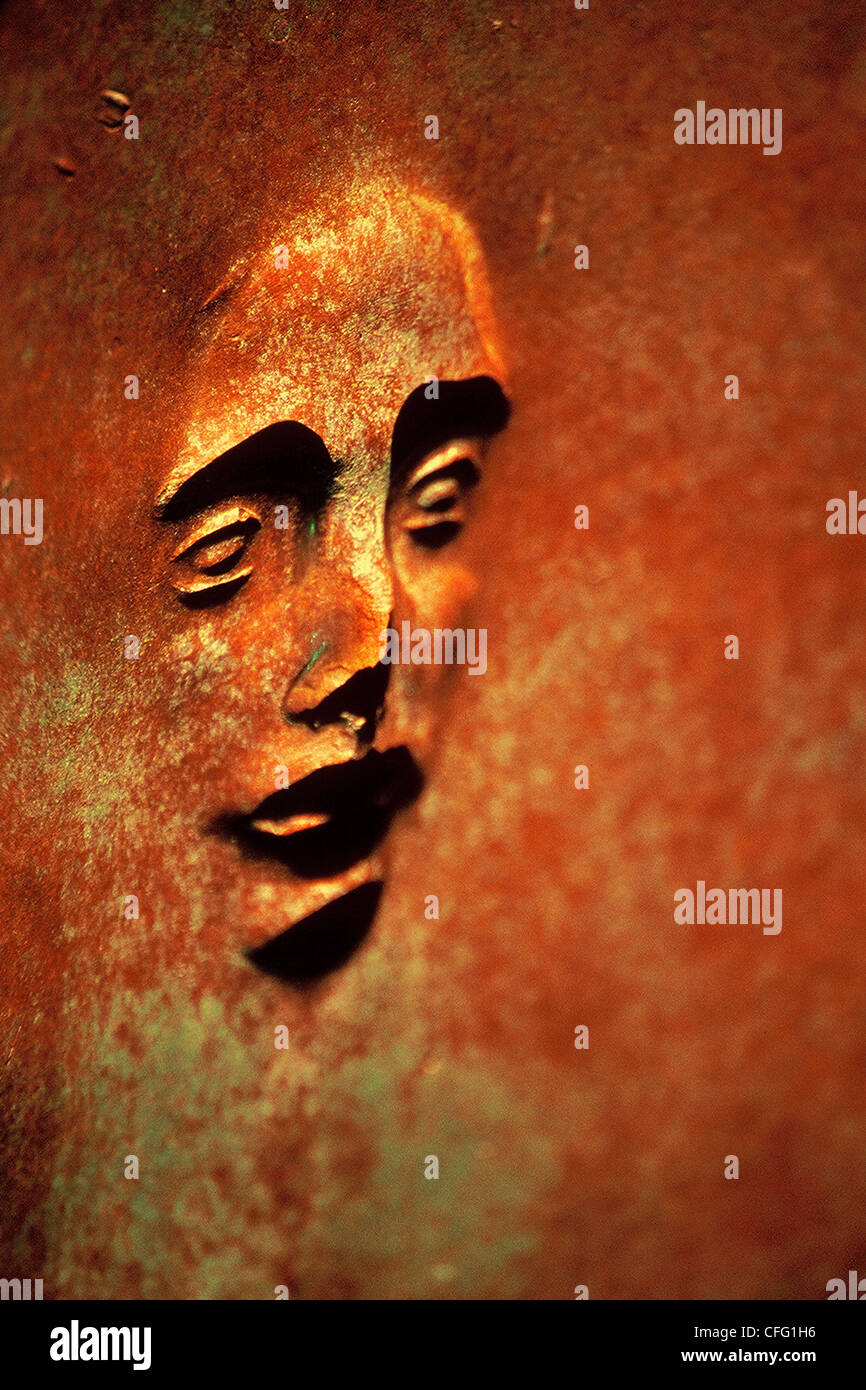 Close up of bronze bas-relief negative figure by Robert Graham Titled ...