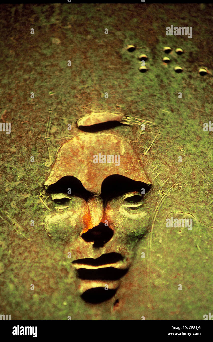 Close up of bronze bas-relief negative figure by Robert Graham Titled ...