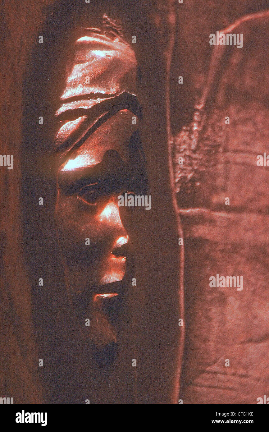 Close up of bronze bas-relief negative figure by Robert Graham Titled ...