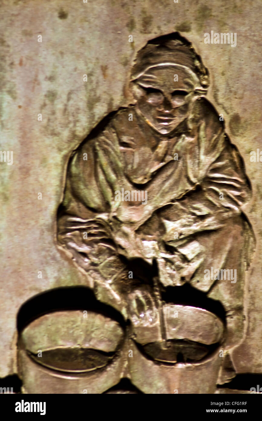Close up of bronze bas-relief negative figure by Robert Graham Titled ...