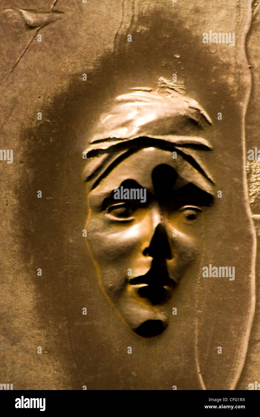 Close up of bronze bas-relief negative figure by Robert Graham Titled ...