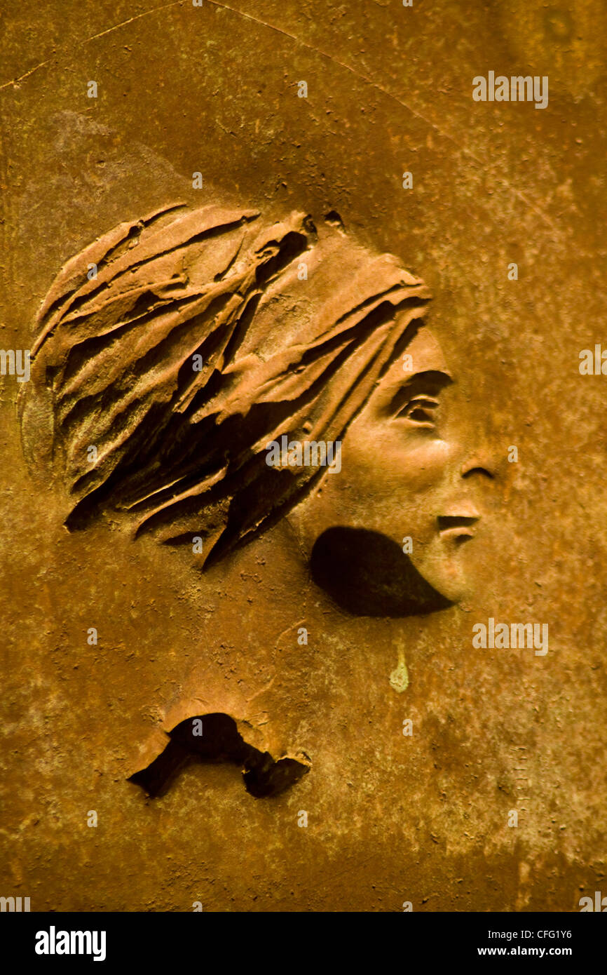 Close up of bronze bas-relief negative figure by Robert Graham Titled ...