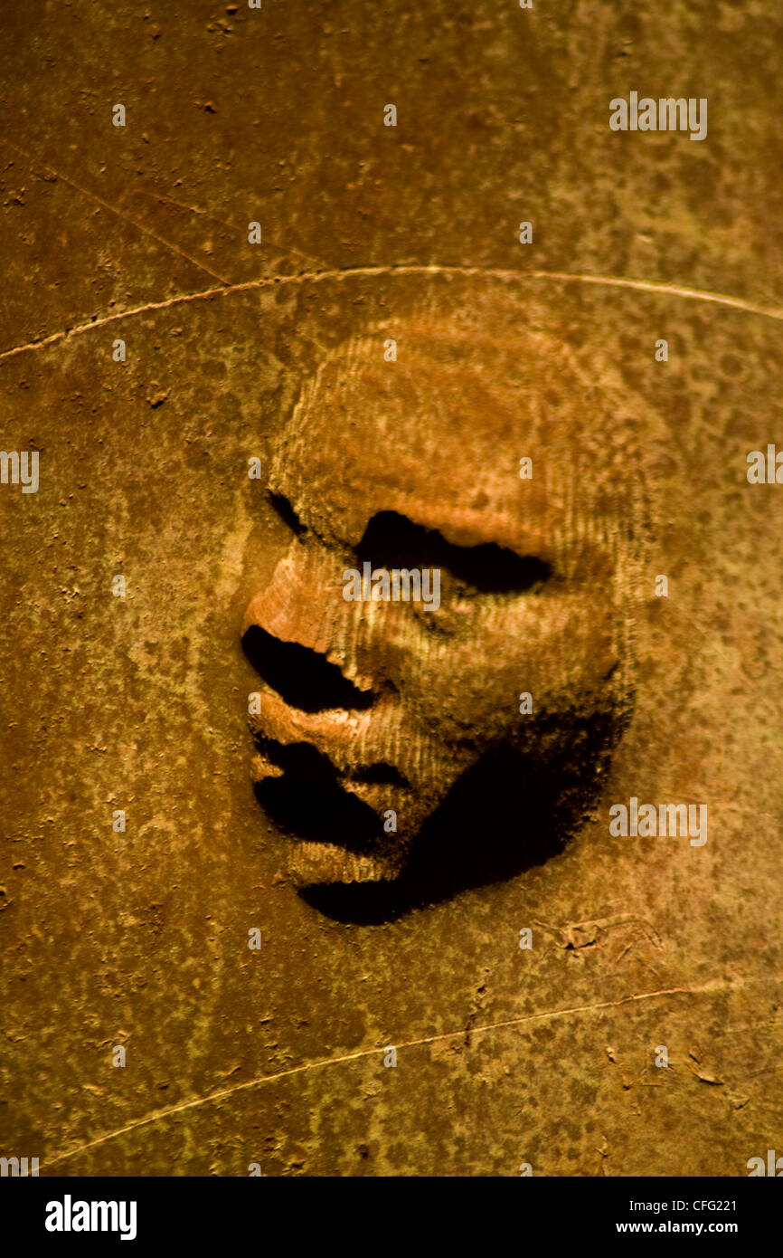 Close up of bronze bas-relief negative figure by Robert Graham Titled ...