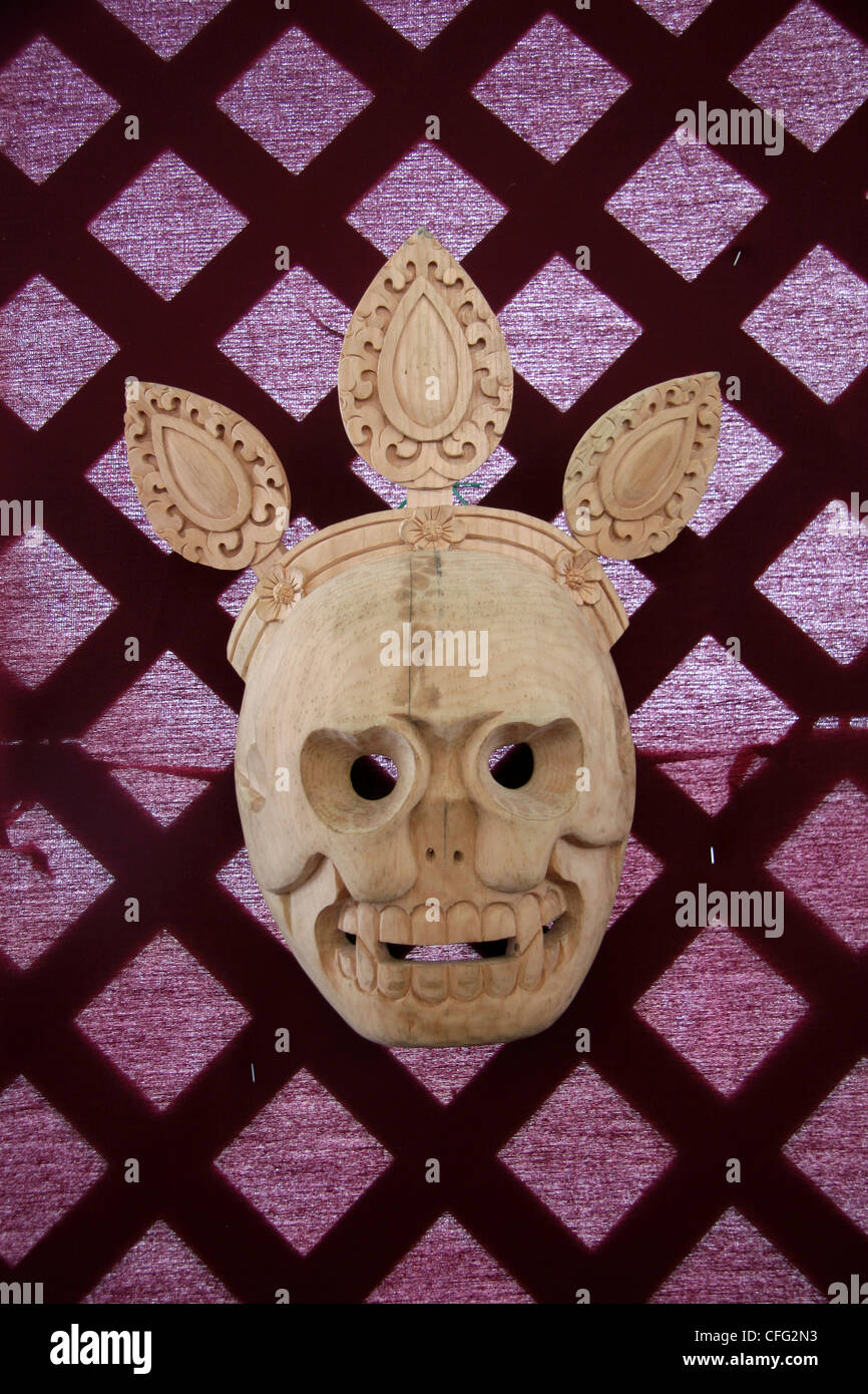 An unfinished wooden Bhutanese mask hanging at 2008 Smithsonian's ...