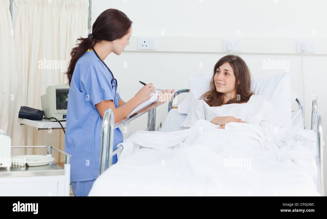 Nurse Aide Observing Patient
