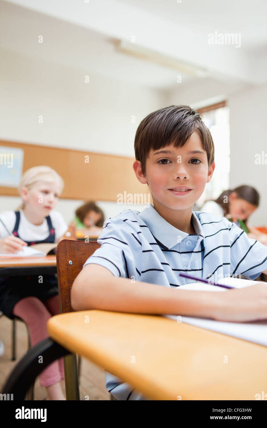 Student sitting in class Stock Photo - Alamy
