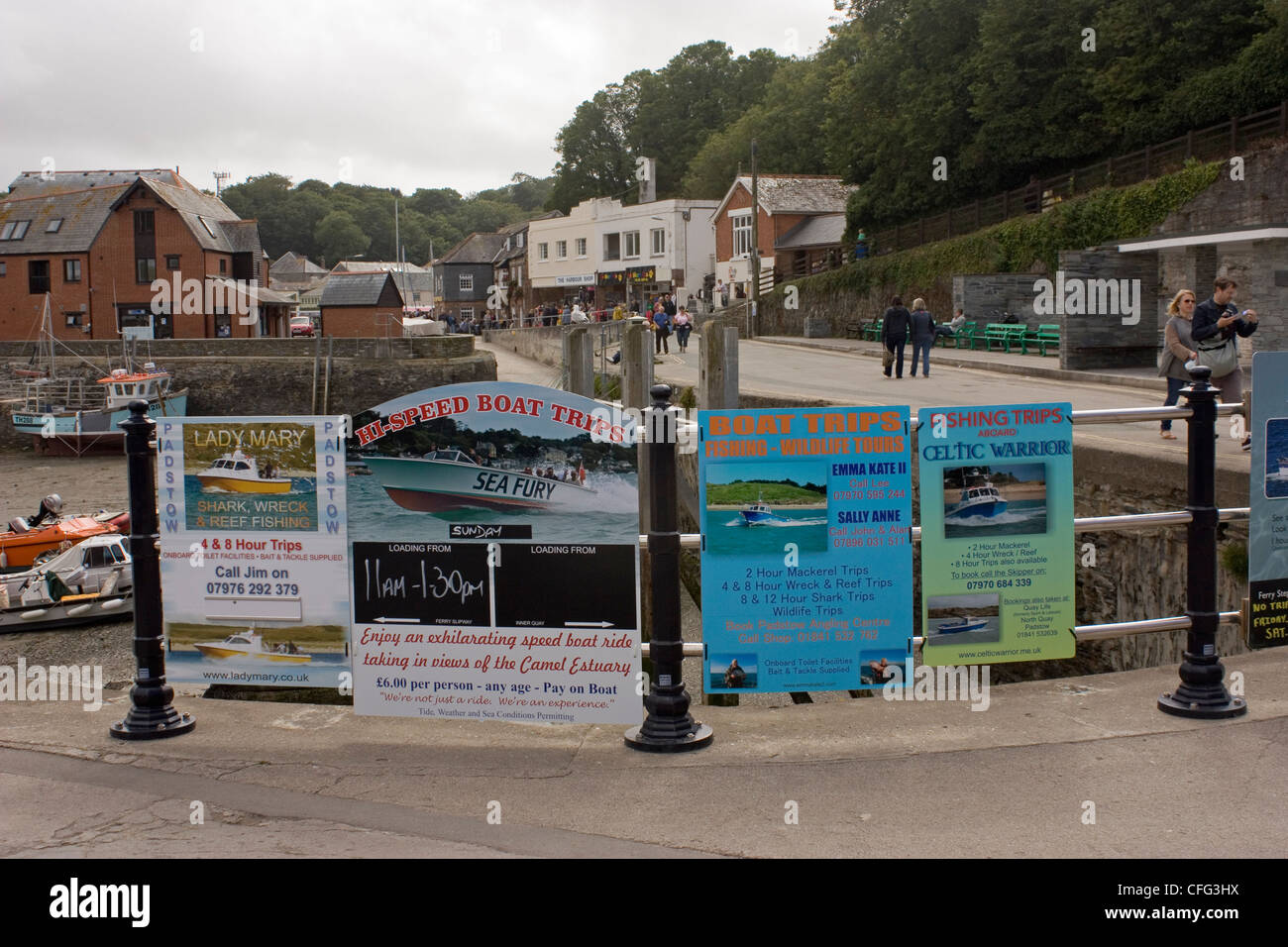 Boat trip signs at Padstow Harbour Cornwall Stock Photo - Alamy