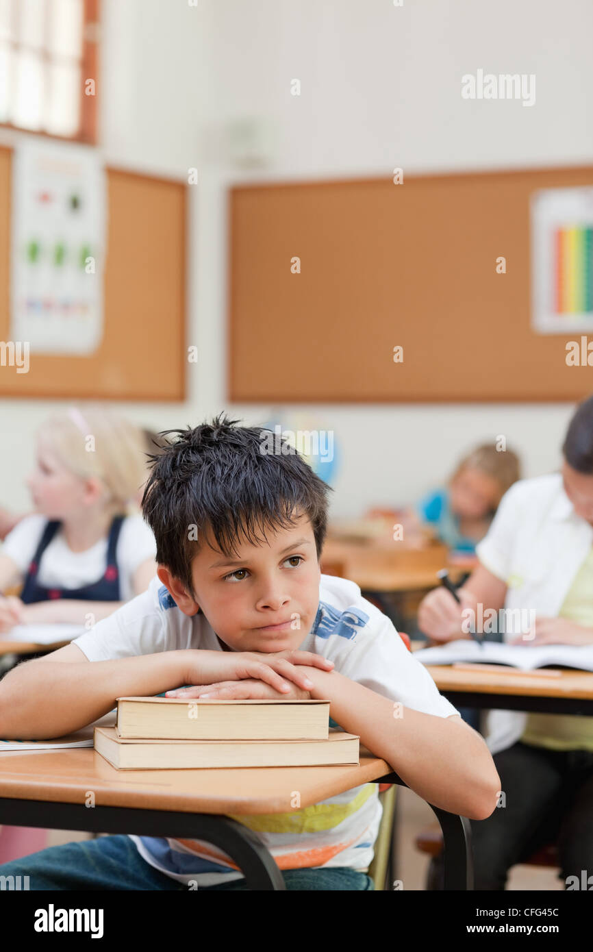 Boy looking sad in class hi-res stock photography and images - Alamy