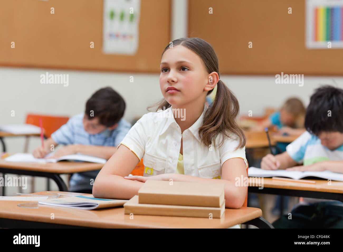 Student looking to the blackboard Stock Photo - Alamy