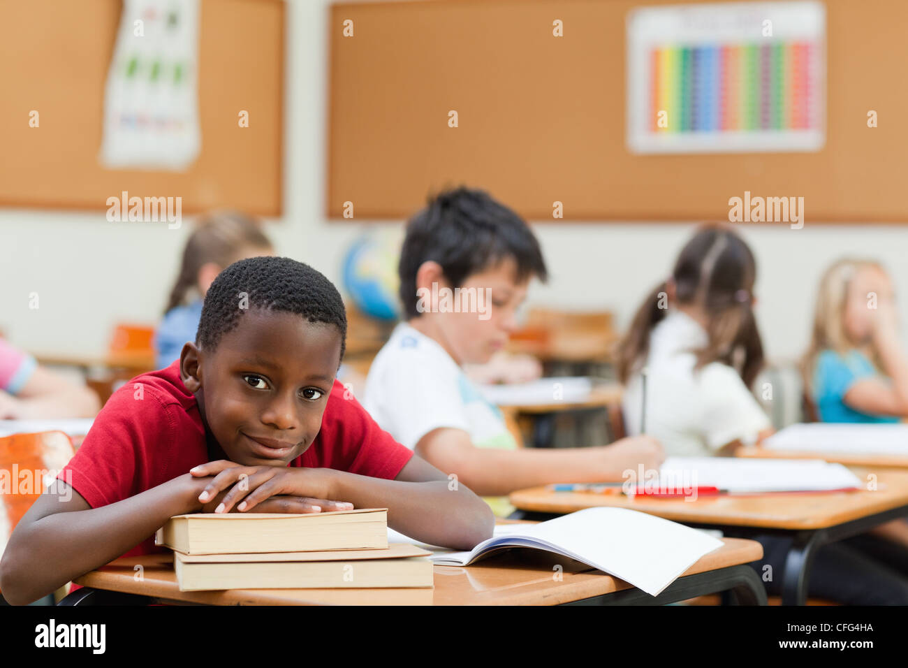 Side view of resting student Stock Photo - Alamy