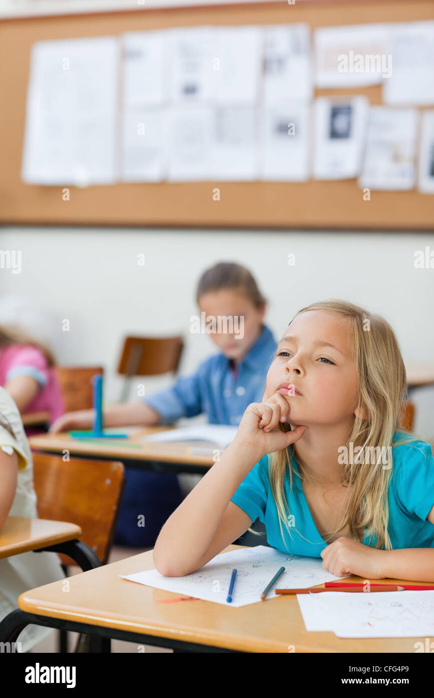 Girl sitting in class Stock Photo - Alamy