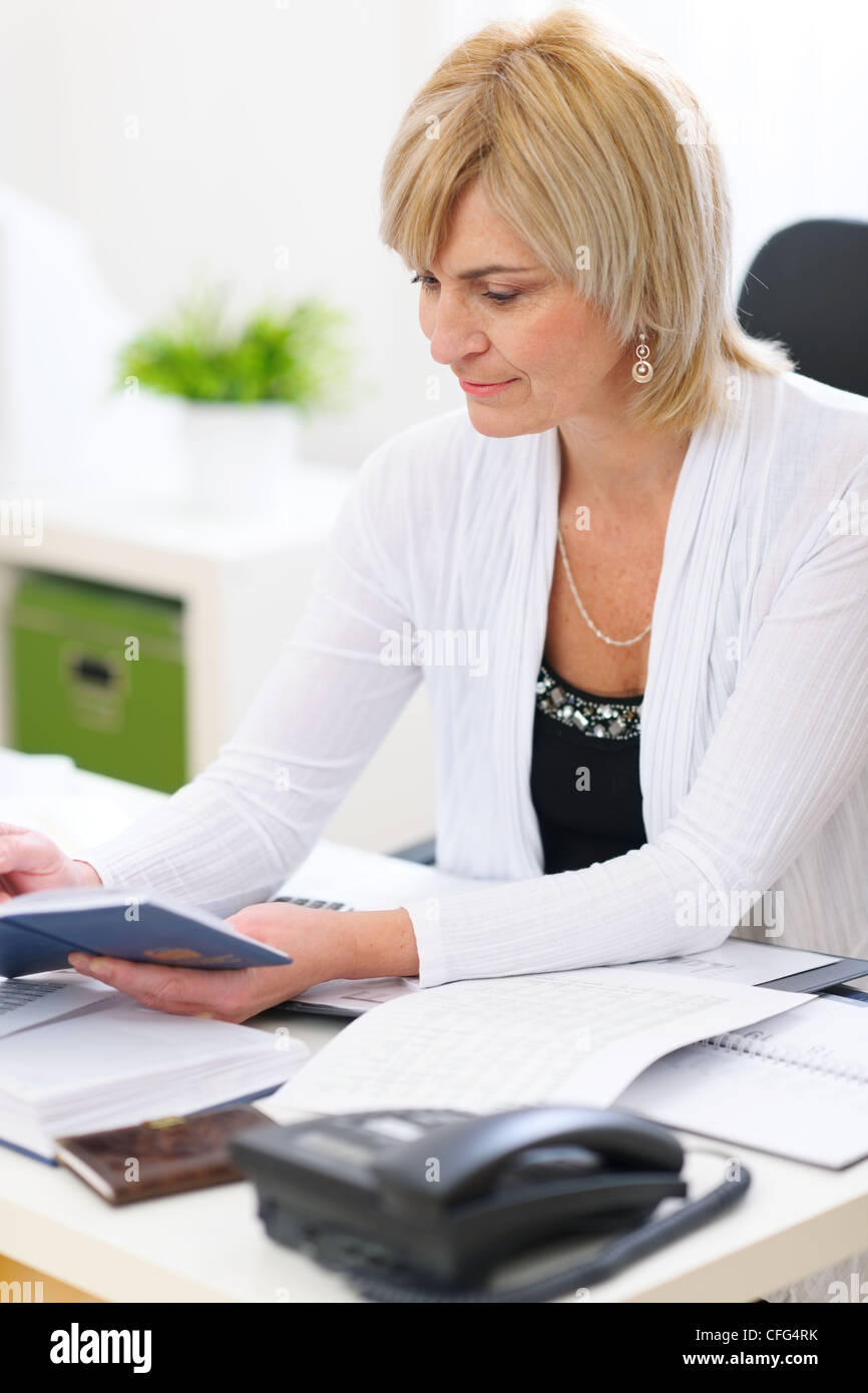 Old business woman working at office Stock Photo - Alamy