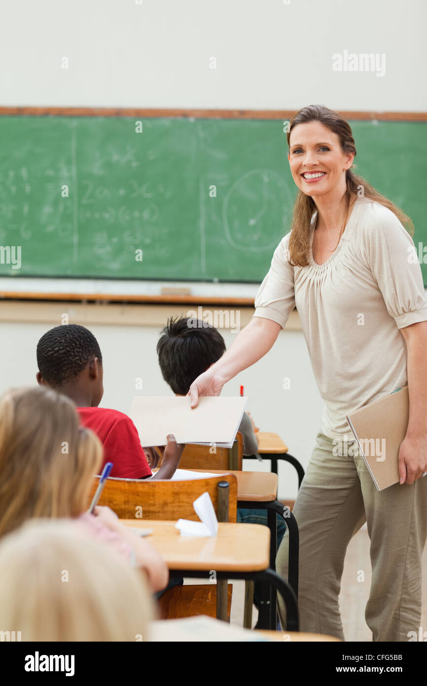 Handing out books hi-res stock photography and images - Alamy