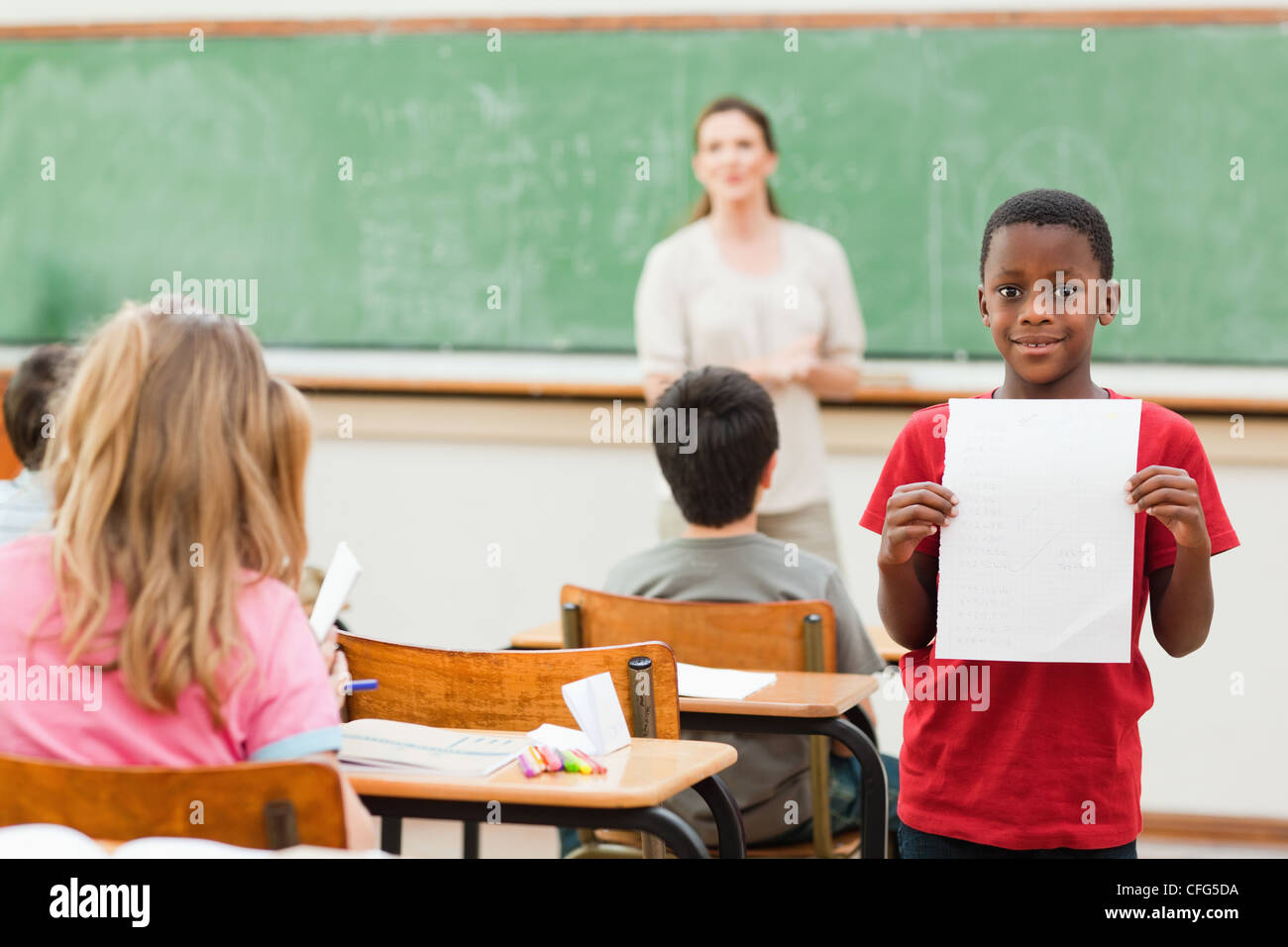 Pupil showing his test results Stock Photo - Alamy
