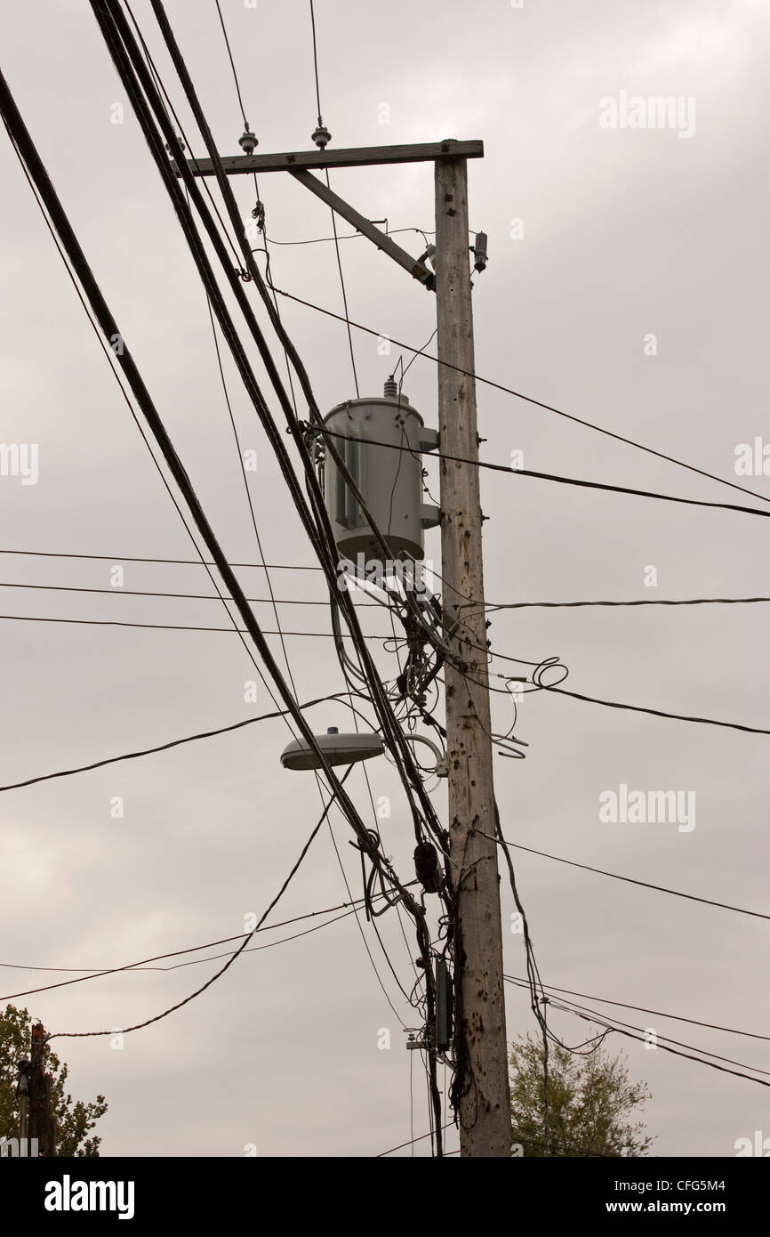 Tangle of overhead utility cables Stock Photo - Alamy