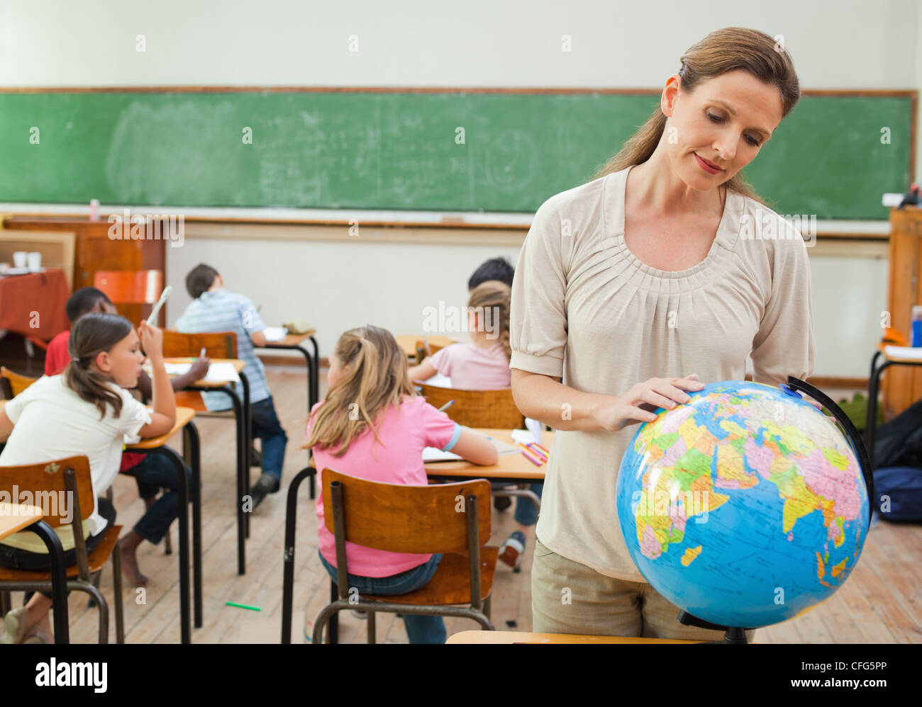 Male teacher students globe hi-res stock photography and images - Alamy