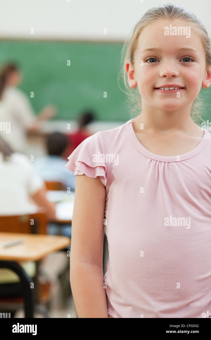 Student standing in the classroom Stock Photo - Alamy
