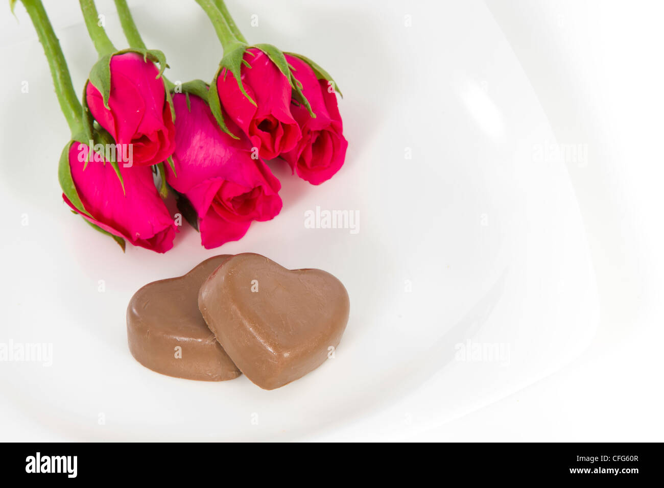 Chocolate heart and rose in the Valentine's Day, white background Stock ...