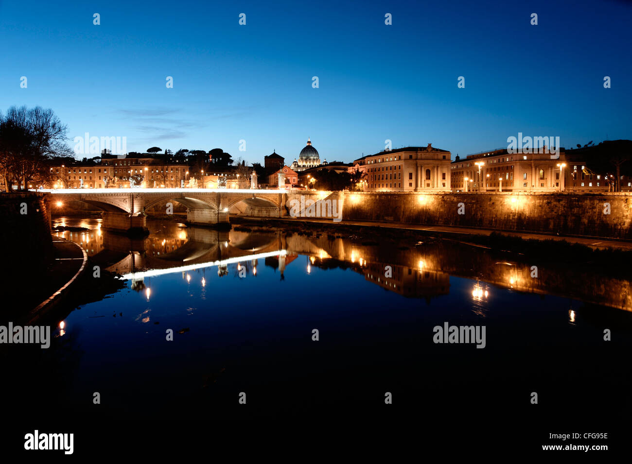 Twilight over the Tiber river in Rome looking towards the Vatican City ...