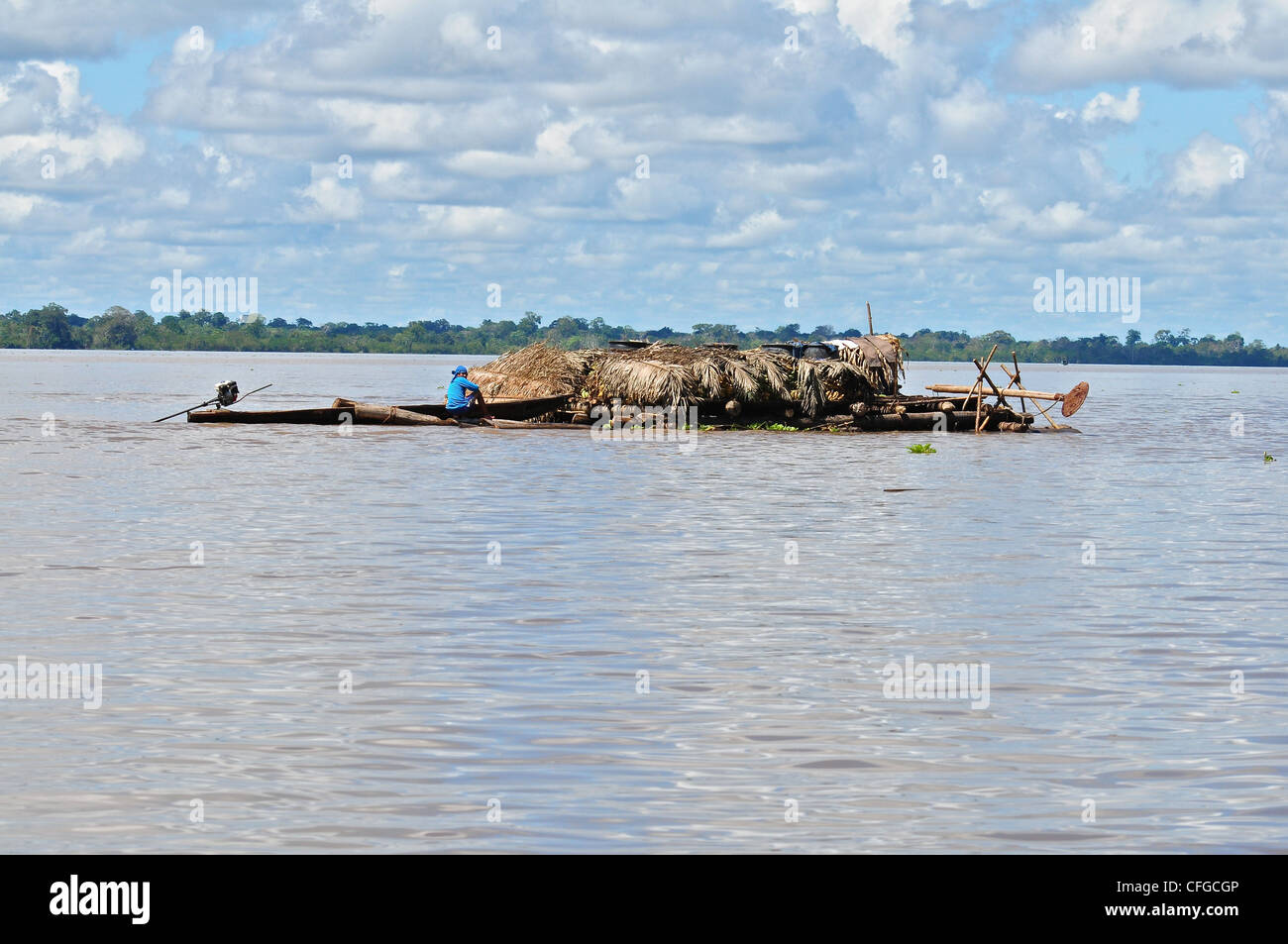 Poor people build floating wood huts on the flooded the Amazon River ...