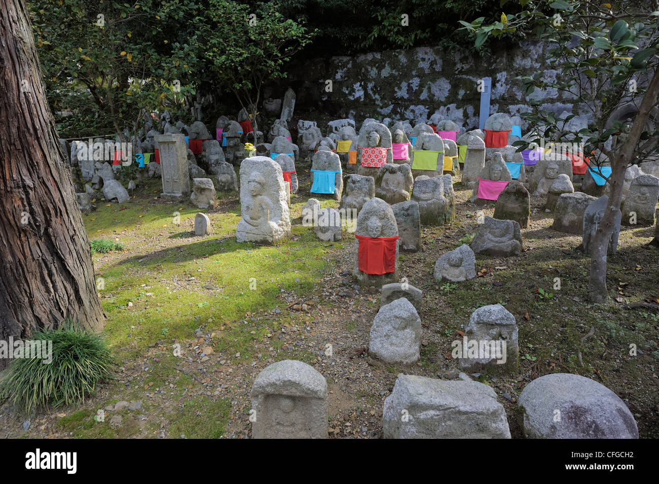 stone figures with bibs, Kyoto, Japan Stock Photo - Alamy