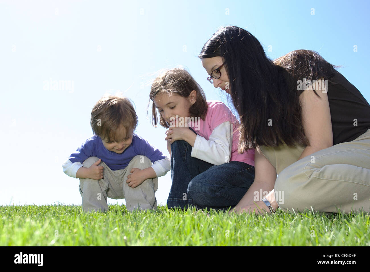 Mother and son looking at insect hi-res stock photography and images ...