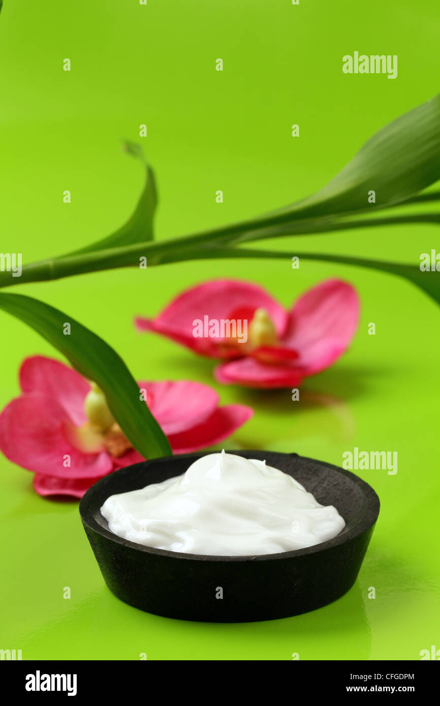 cream for face and body on a green background, spa concept Stock Photo ...