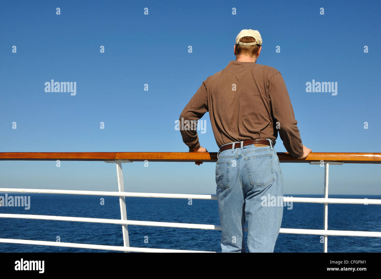 Back of man standing on deck of ship hi-res stock photography and ...