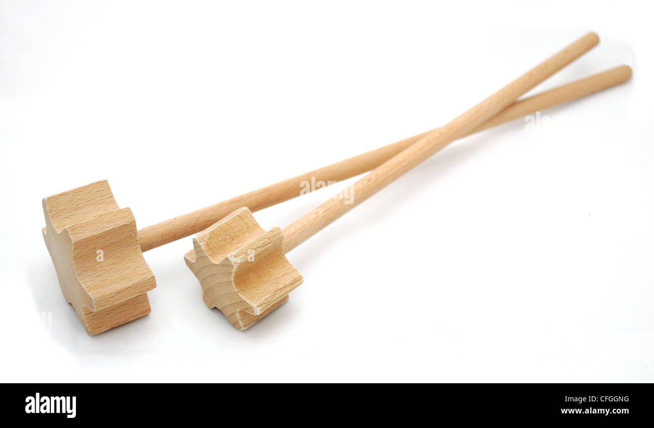 Wood beaters placed on white background Stock Photo - Alamy