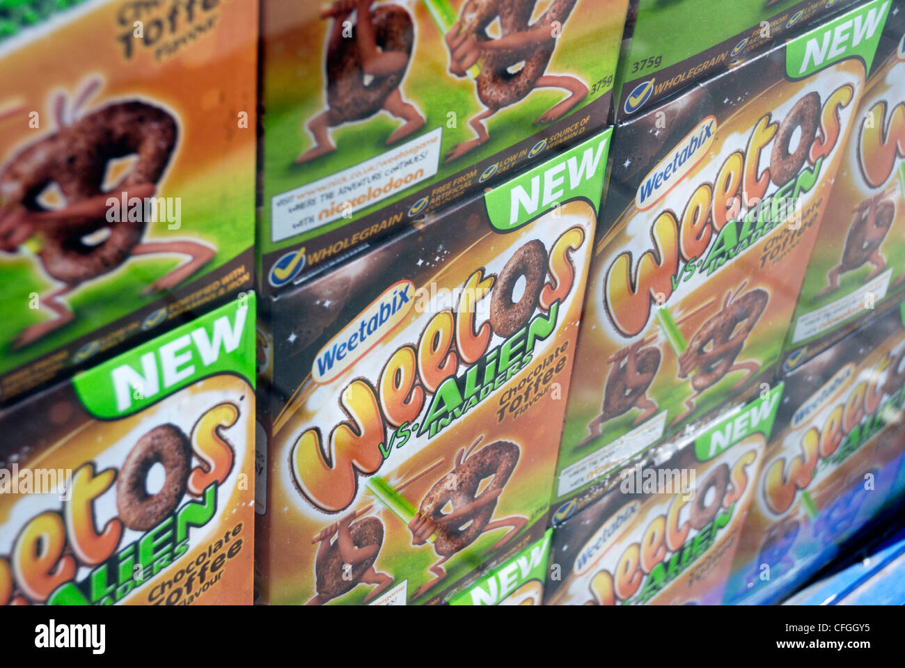 Weetabix Weetos cereal packets on display in a shop window Stock Photo ...