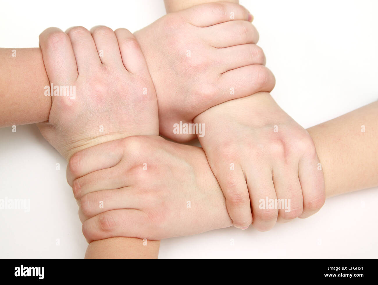 Crossed arms of two girls Stock Photo - Alamy