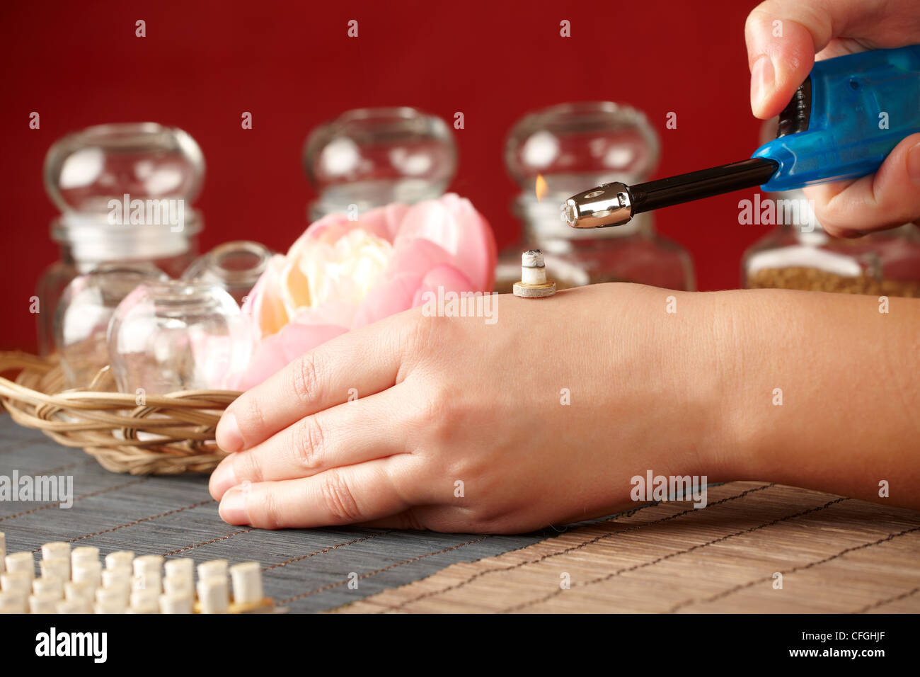 TCM Traditional Chinese Medicine. Hand lighting mini moxa stick, flower ...