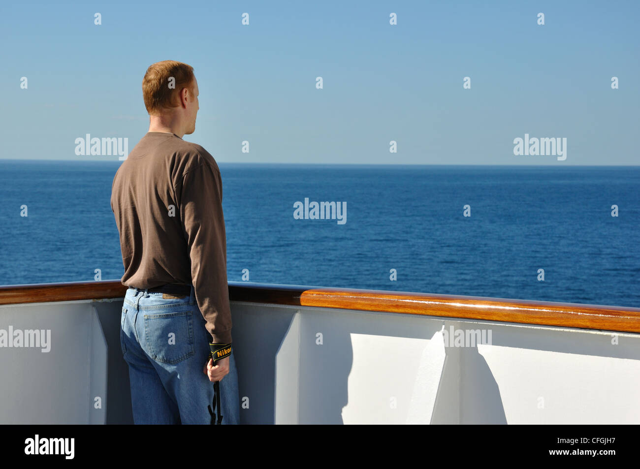 Man standing on ship deck hi-res stock photography and images - Alamy