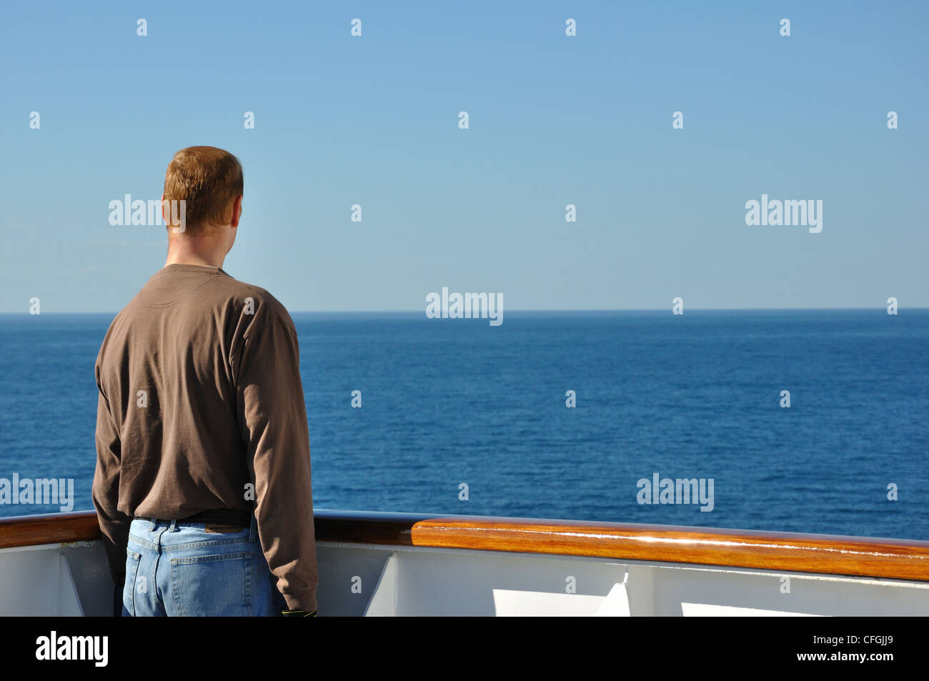Man standing on ship deck hi-res stock photography and images - Alamy