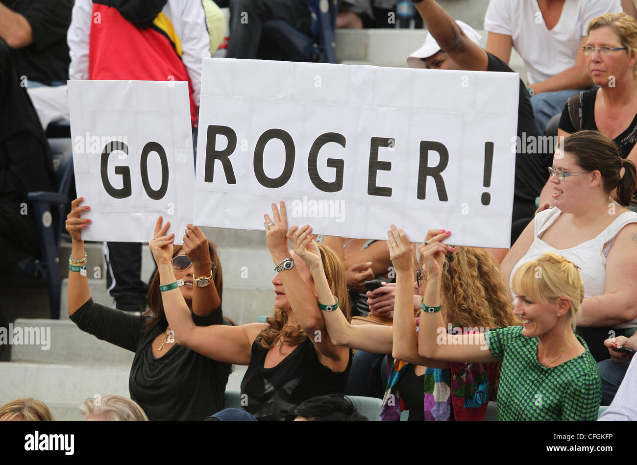Roger Federer fans hold up sign GO ROGER ! Stock Photo - Alamy