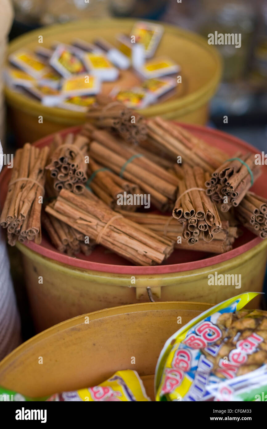 Cinnamon stacks in market Stock Photo - Alamy