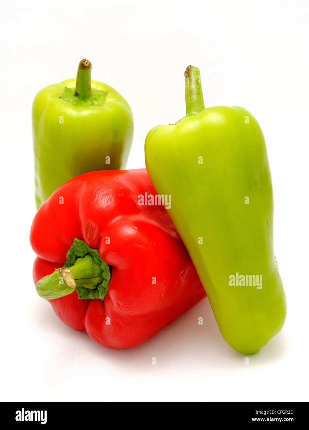 Red and green pepper placed on the white background Stock Photo - Alamy