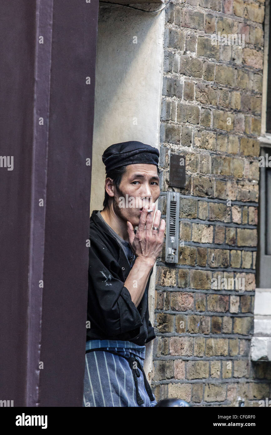 A chef at a Vietnamese takes a break Stock Photo - Alamy