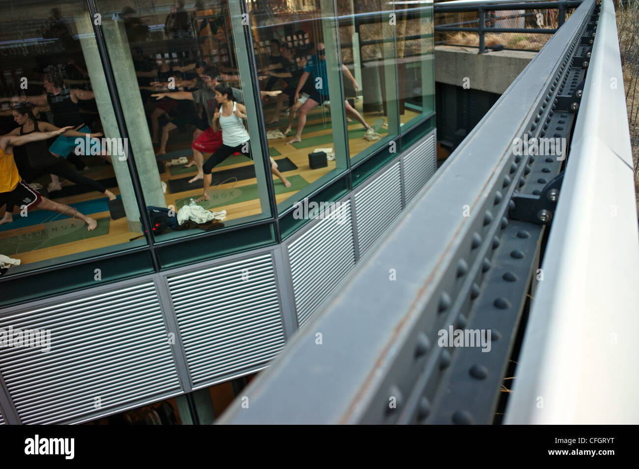 A yoga class in a building next to The High Line Public Park Stock ...
