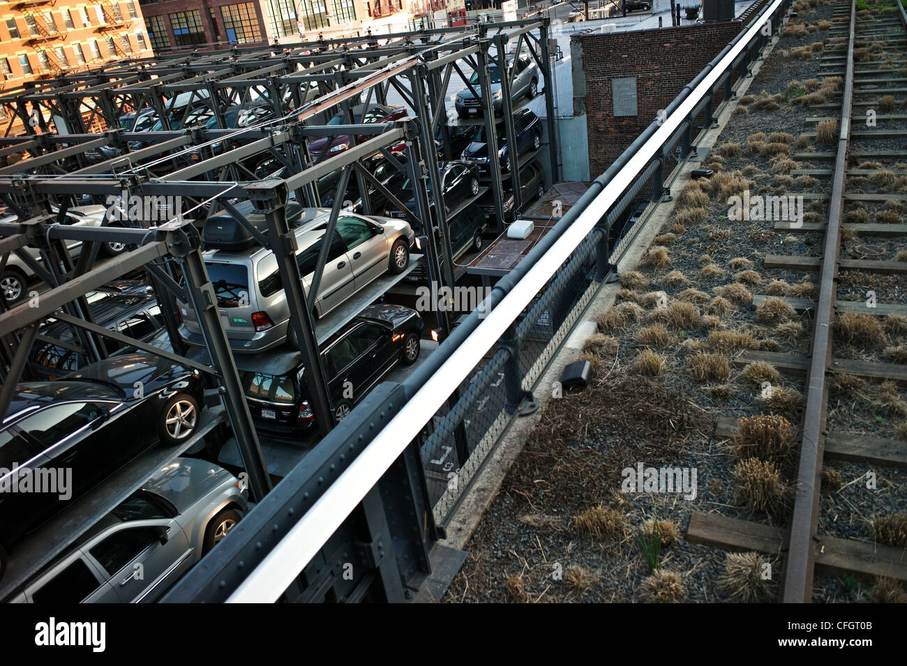 Elevated cars in parking lots next to The High Line Public Park Stock ...