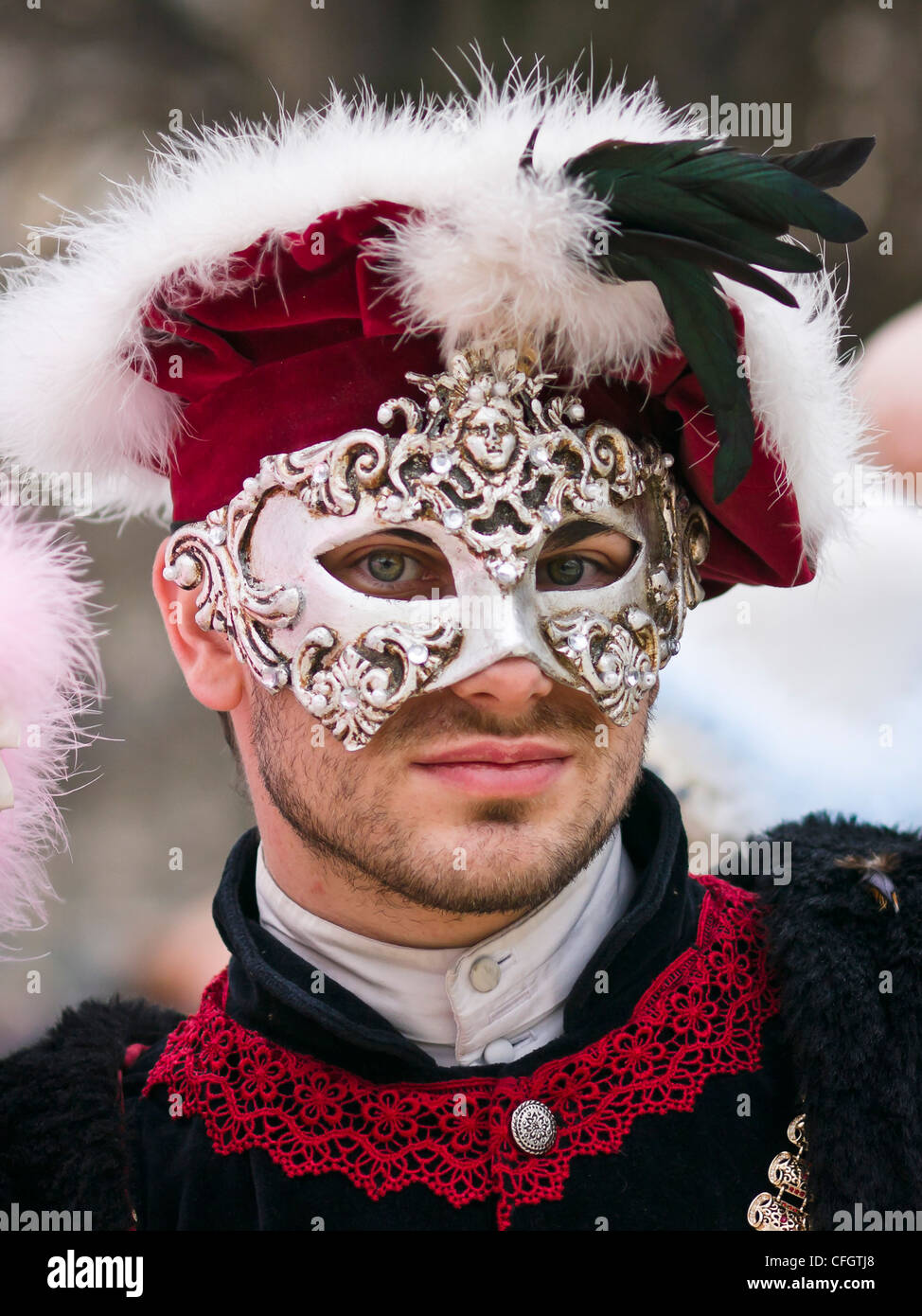 Venetian carnival mask costume parade Stock Photo - Alamy