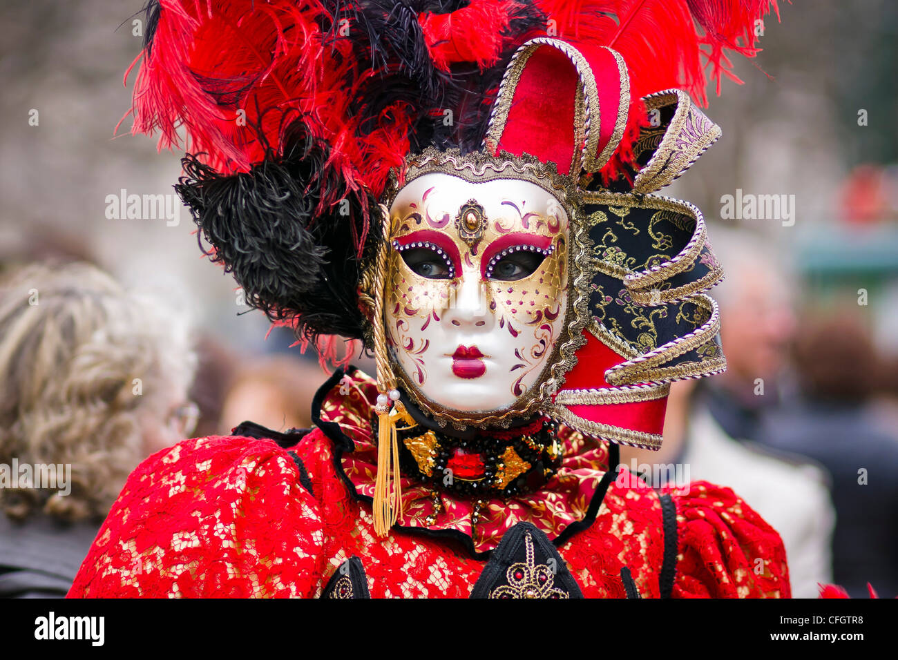 Venetian carnival mask costume parade Stock Photo - Alamy