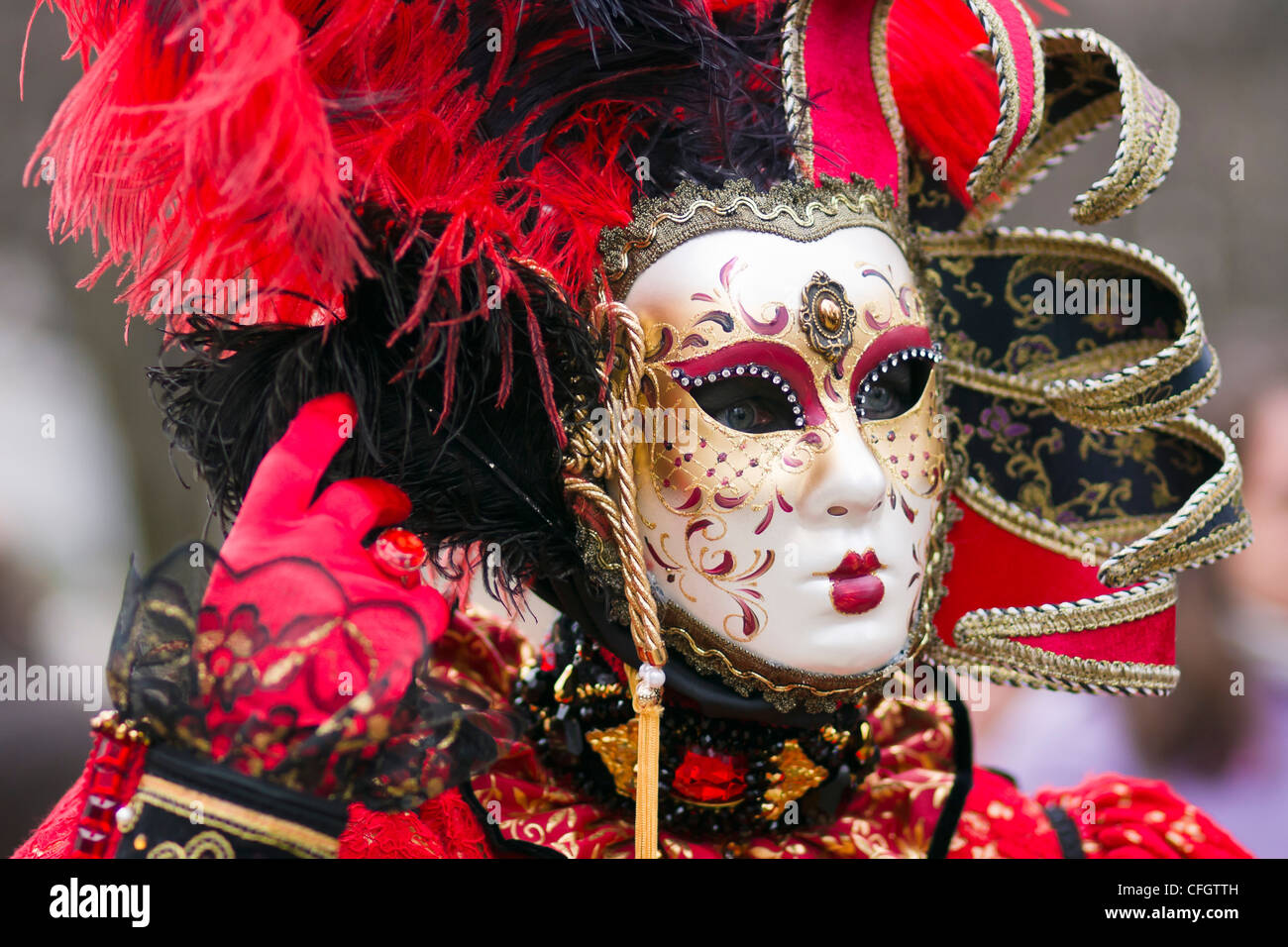 Venetian carnival mask costume parade Stock Photo - Alamy