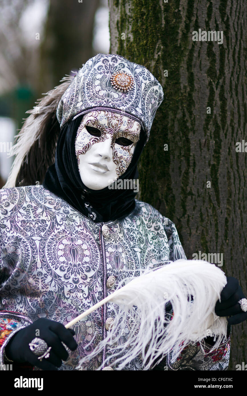 Venetian carnival mask costume parade Stock Photo - Alamy